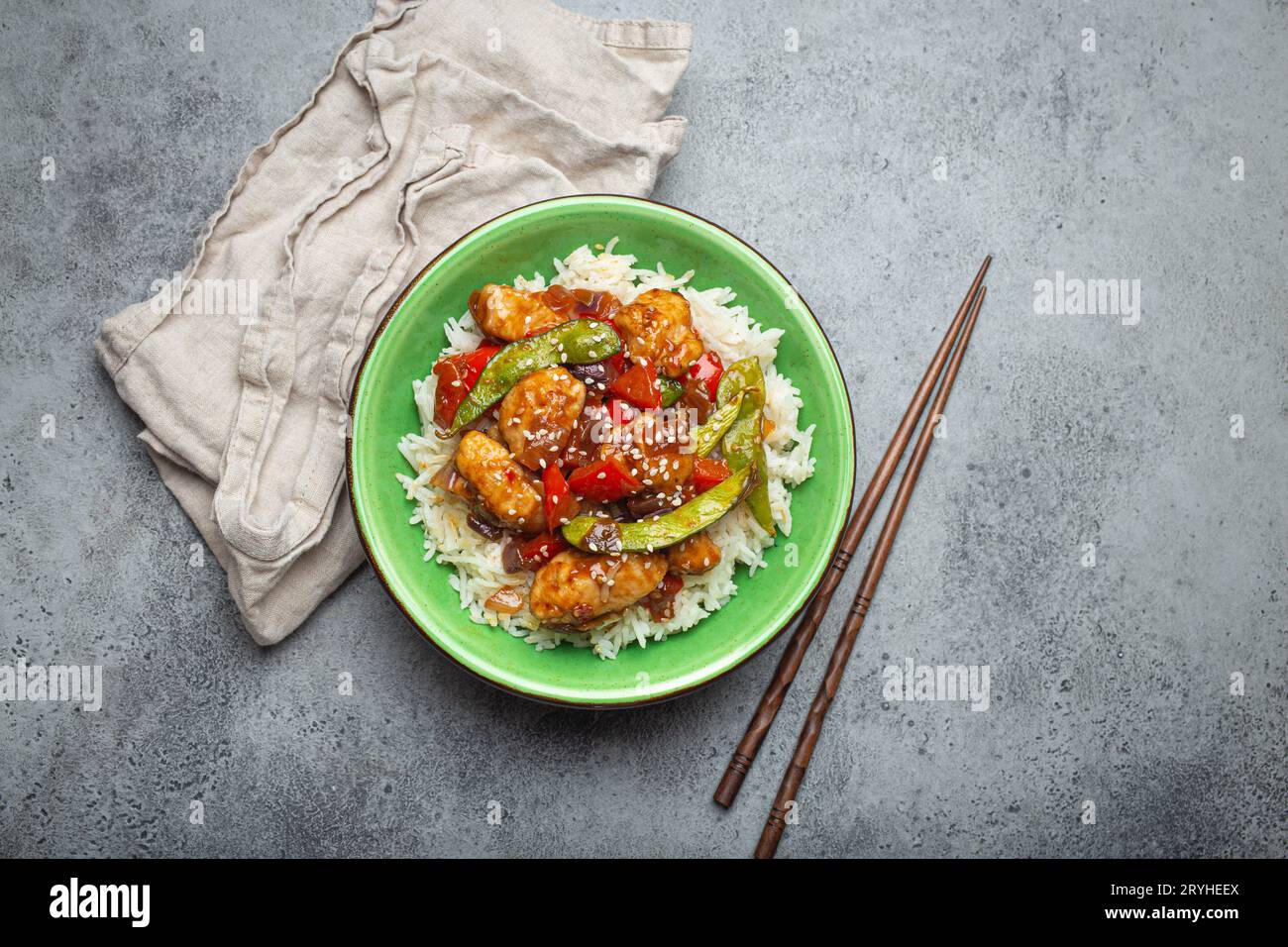 Asian sweet and sour sticky chicken with vegetables stir-fry and rice ...