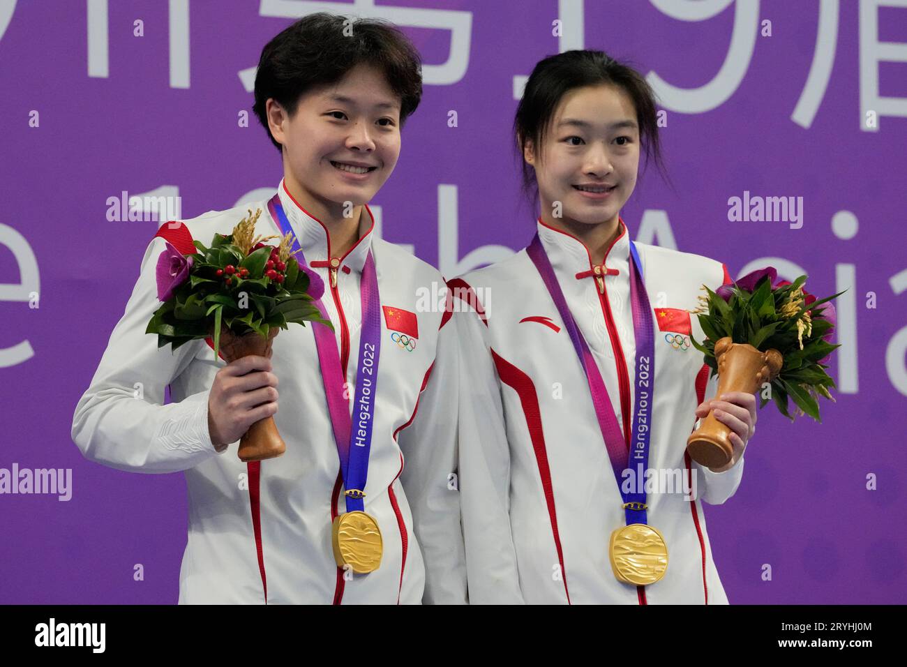 Gold medalist China's Chen Yiwen and Chang Yani pose during ceremonies ... Gold medalist China's Chen Yiwen and Chang Yani pose during ceremonies ...