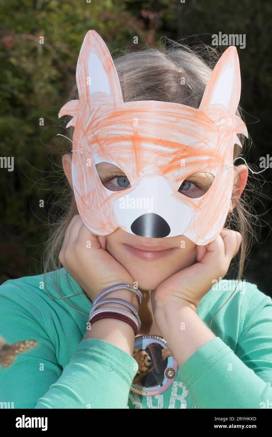 Person Wearing A Animal Mask On The Head Hiding The Face Person Wearing ...