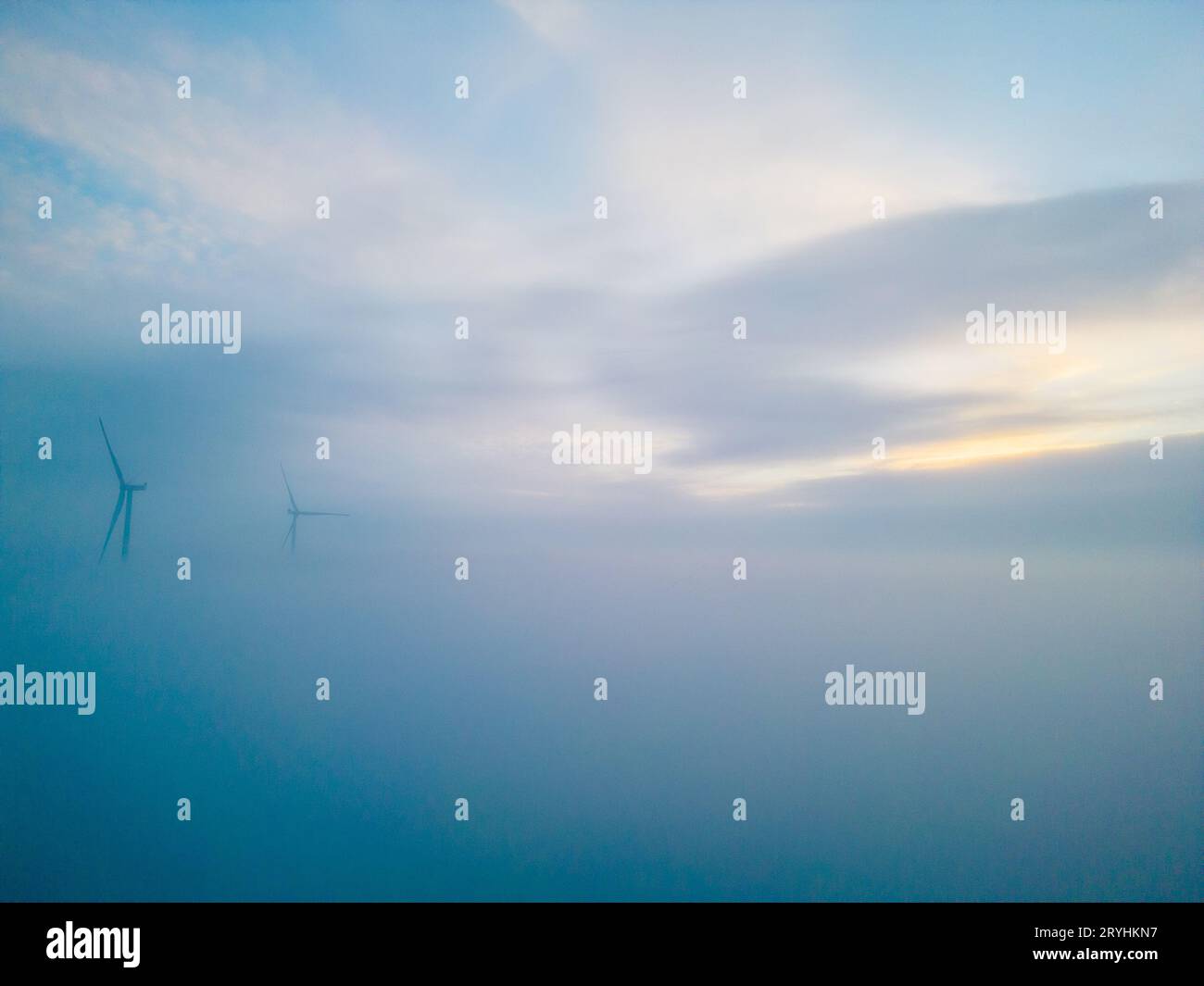 Aerial view of wind turbines or windmills farm field in industry ...