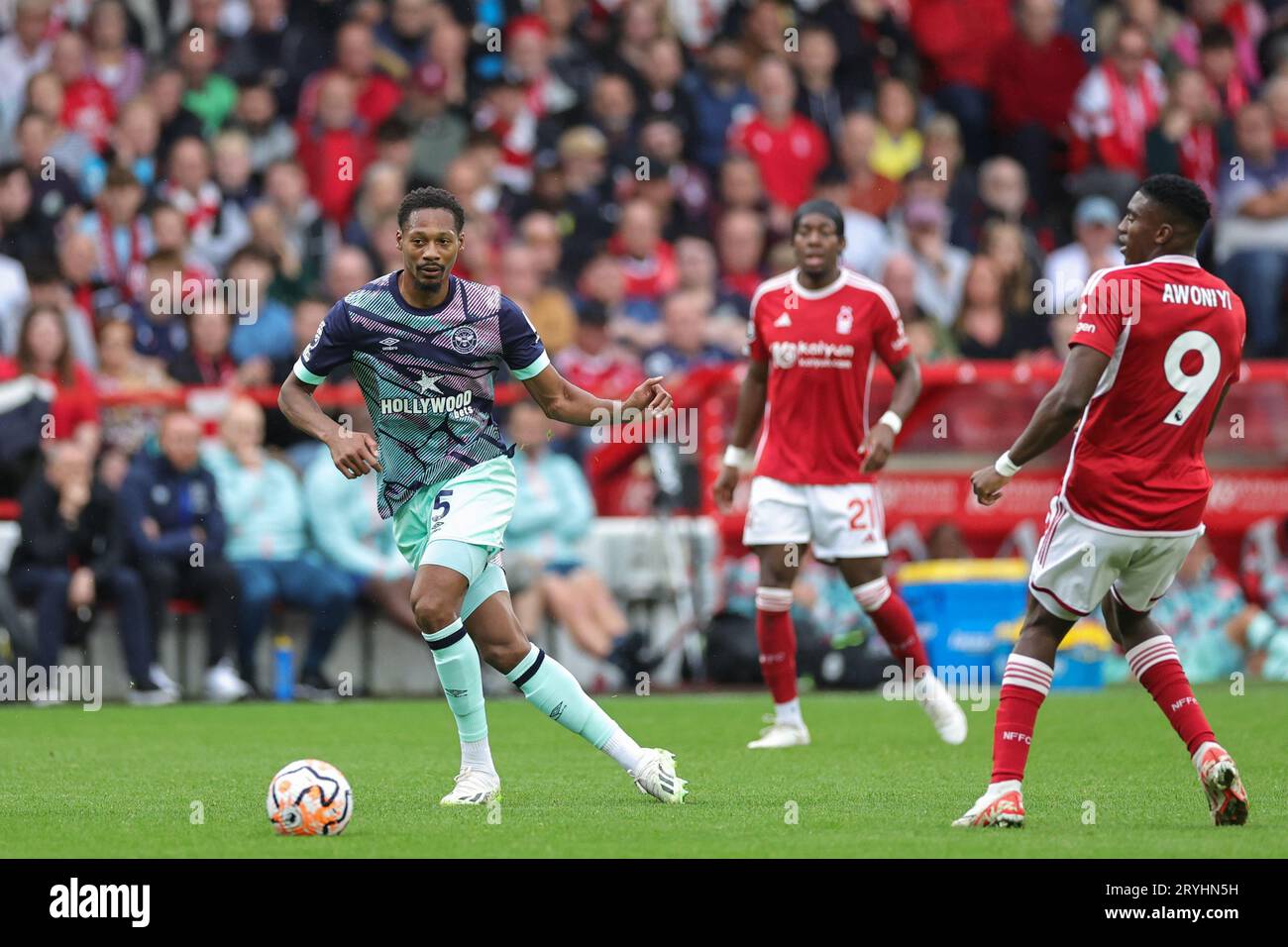 Ethan Pinnock #5 of Brentford passes the ball during the Premier League ...