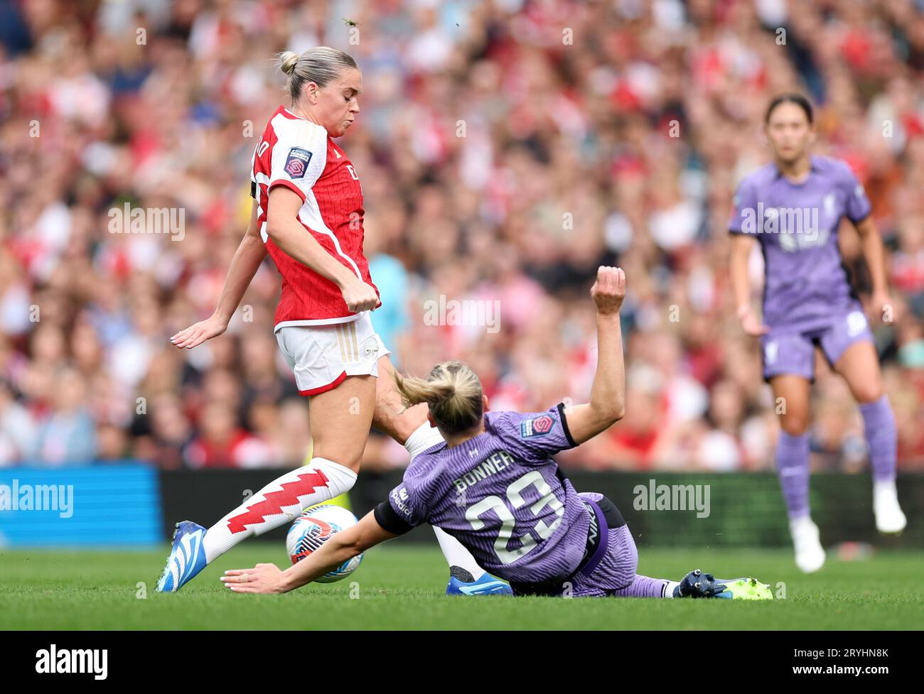 Arsenal's Alessia Russo (left) and Liverpool's Gemma Bonner battle for ...