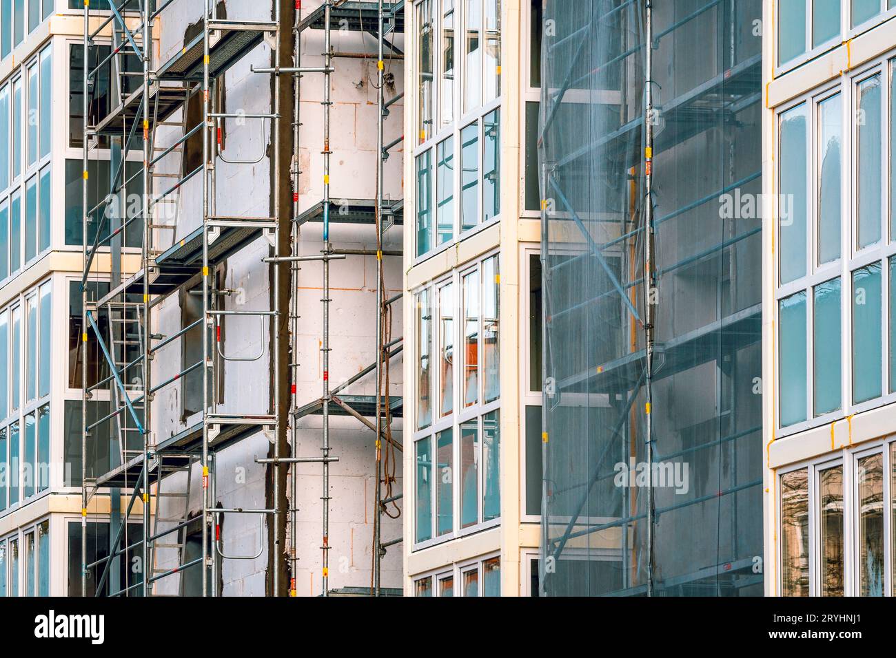 Scaffolding on multistory building facade during renovation Stock Photo ...