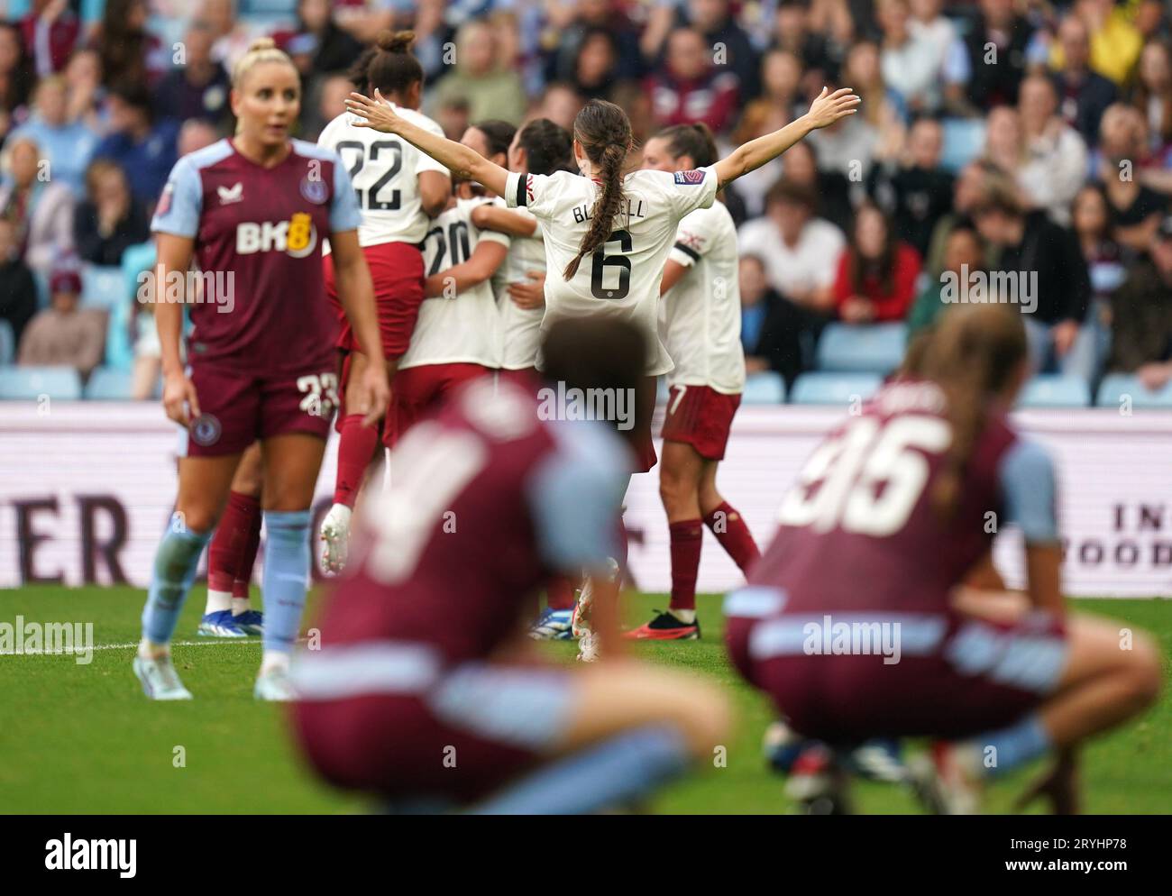 Manchester United's Rachel Williams (obscured) celebrates scoring their ...