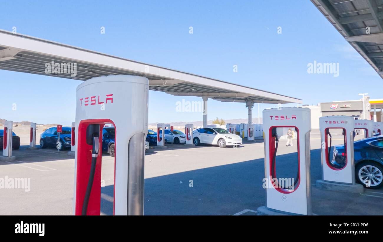 Daytime Tesla Charging, Supercharging Station Power-Up Stock Photo - Alamy
