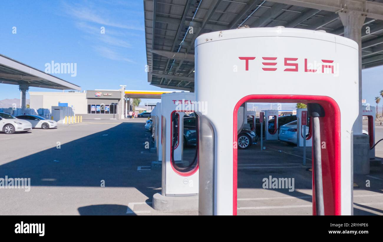 Daytime Tesla Charging, Supercharging Station Power-Up Stock Photo - Alamy