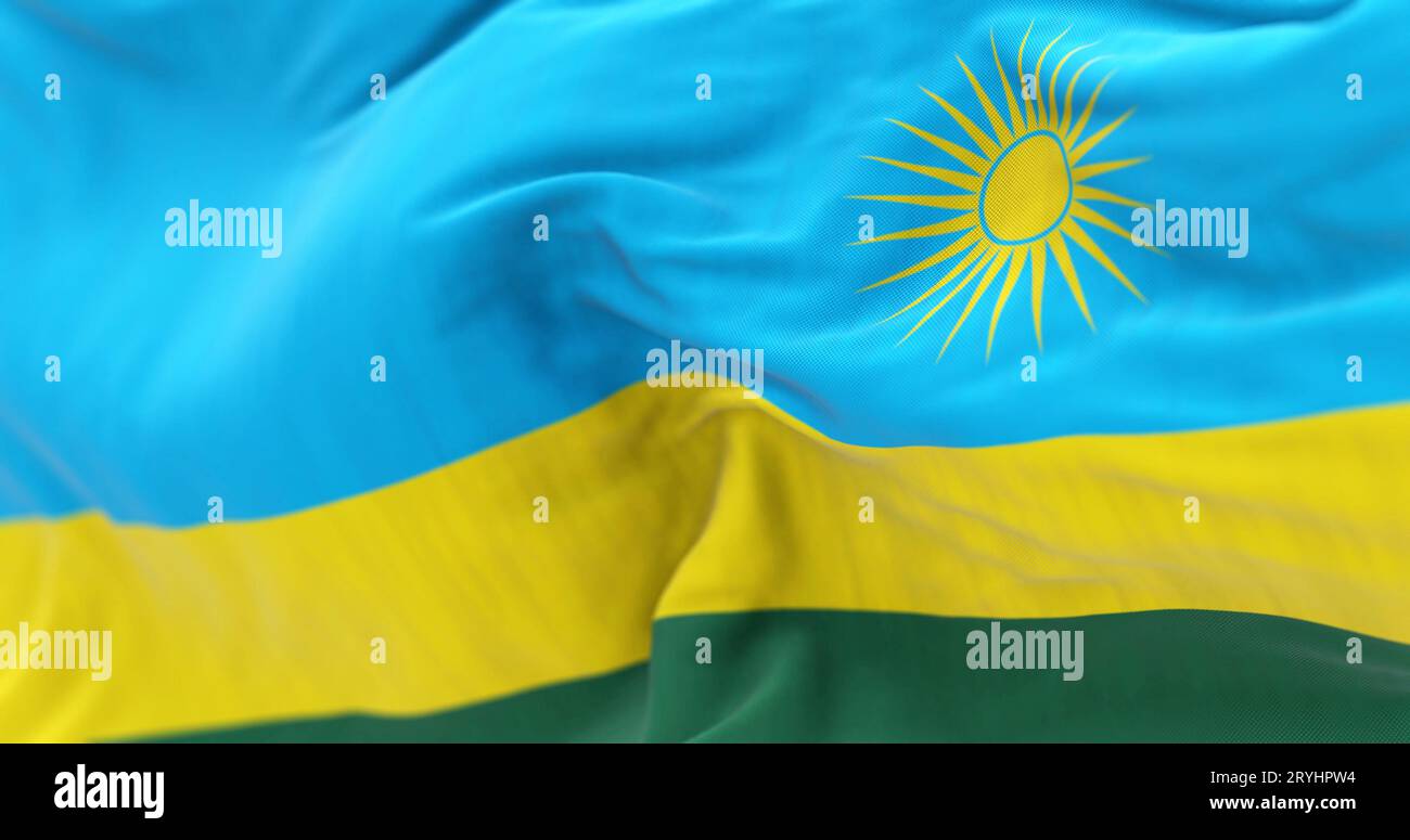 Close-up view of the Rwanda national flag waving Stock Photo - Alamy