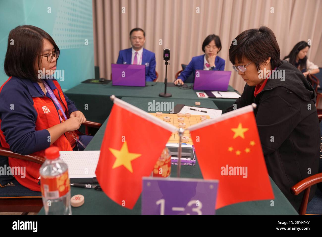 Hangzhou, China's Zhejiang Province. 1st Oct, 2023. Wang Linna (R) of ...