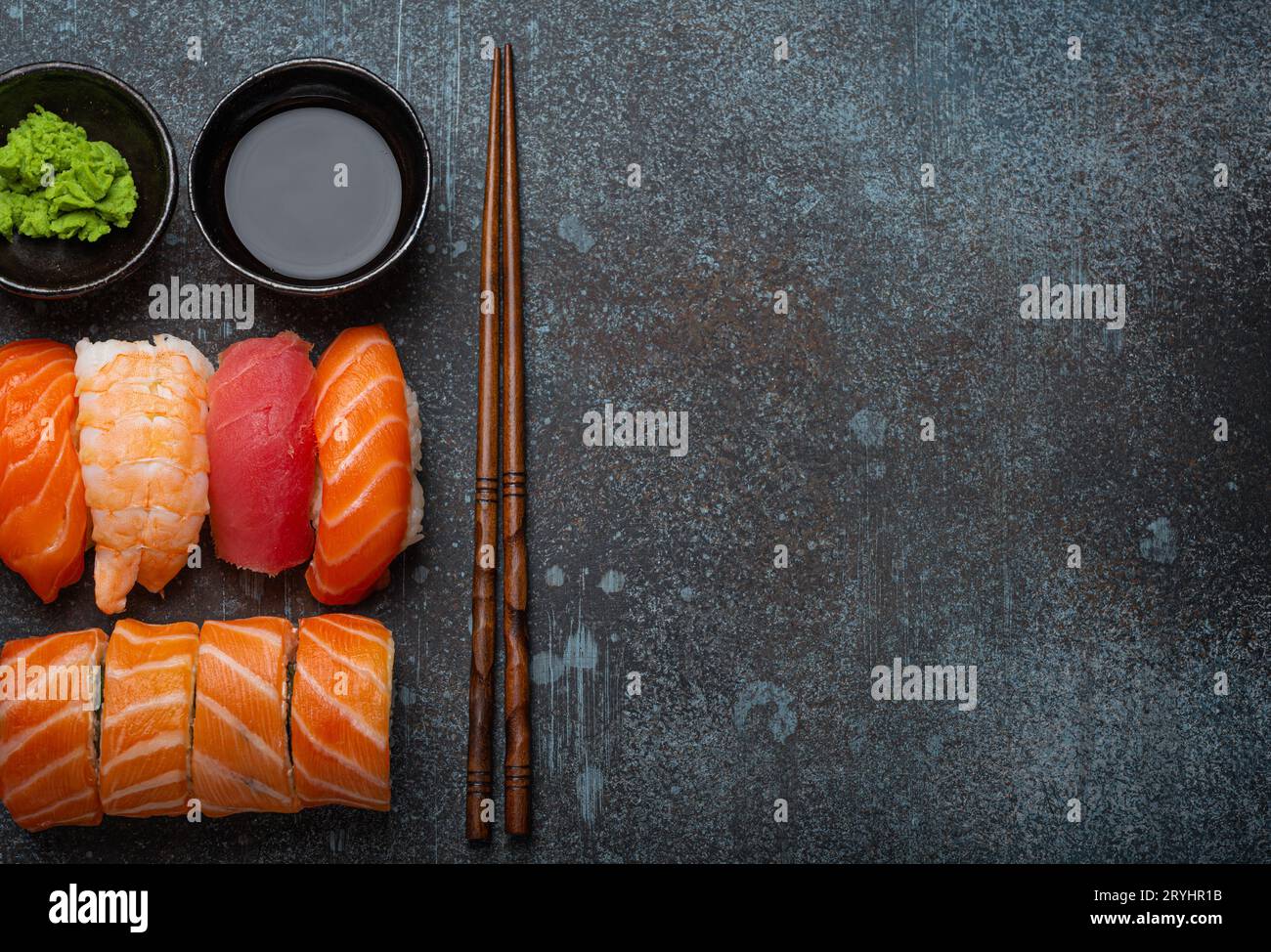 Set of traditional Japanese sushi and rolls top view with soy sauce and ...