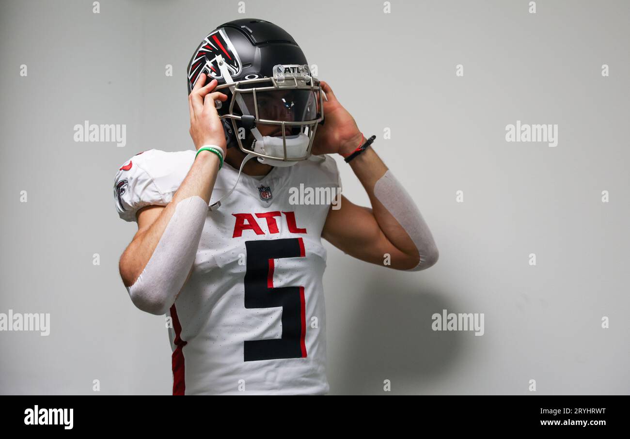 Atlanta Falcons’ Drake London puts on his helmet ahead of the NFL ...