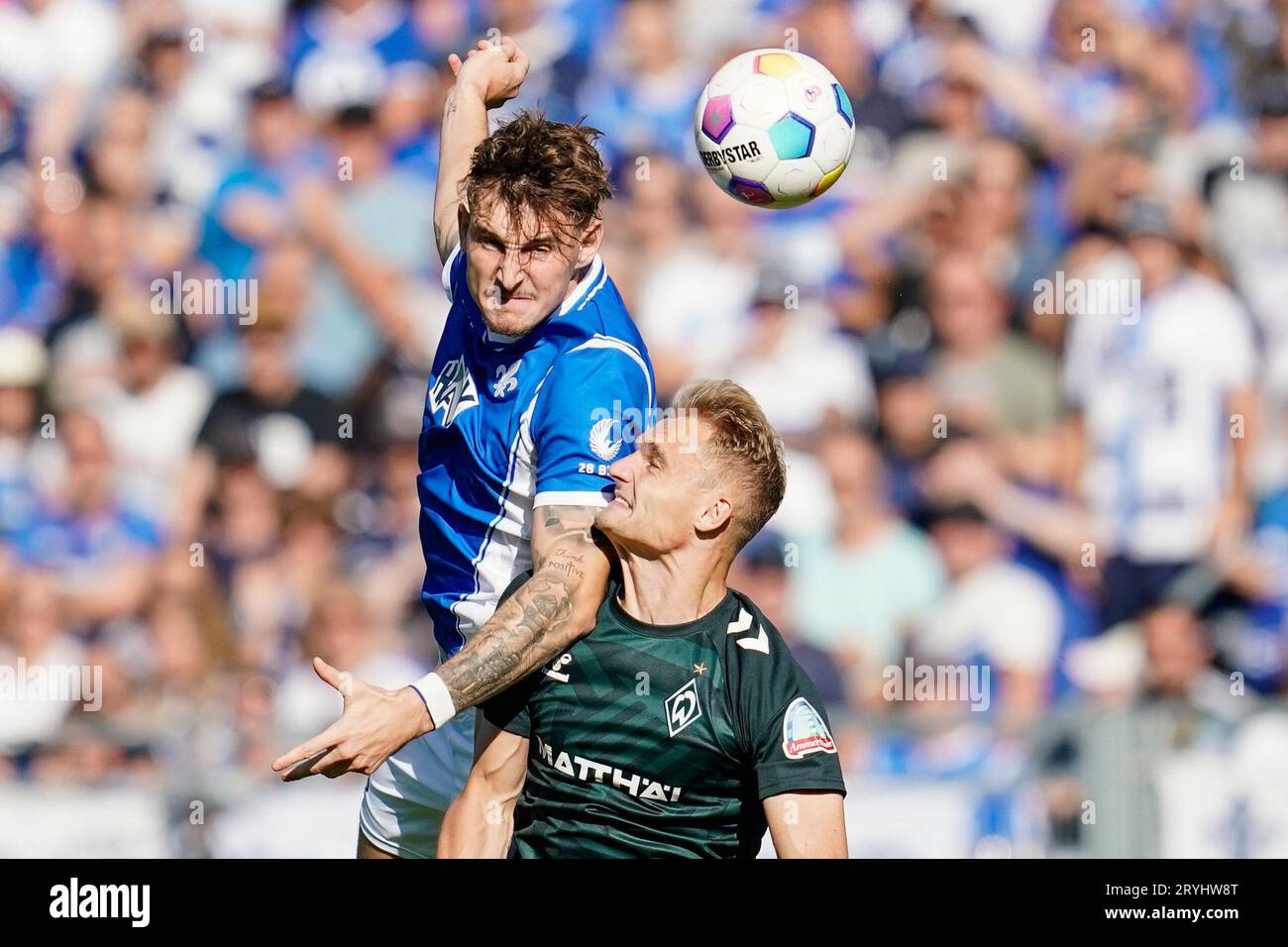 Darmstadt's Matej Maglica, left, and Bremen's Amos Pieper fight for the ...