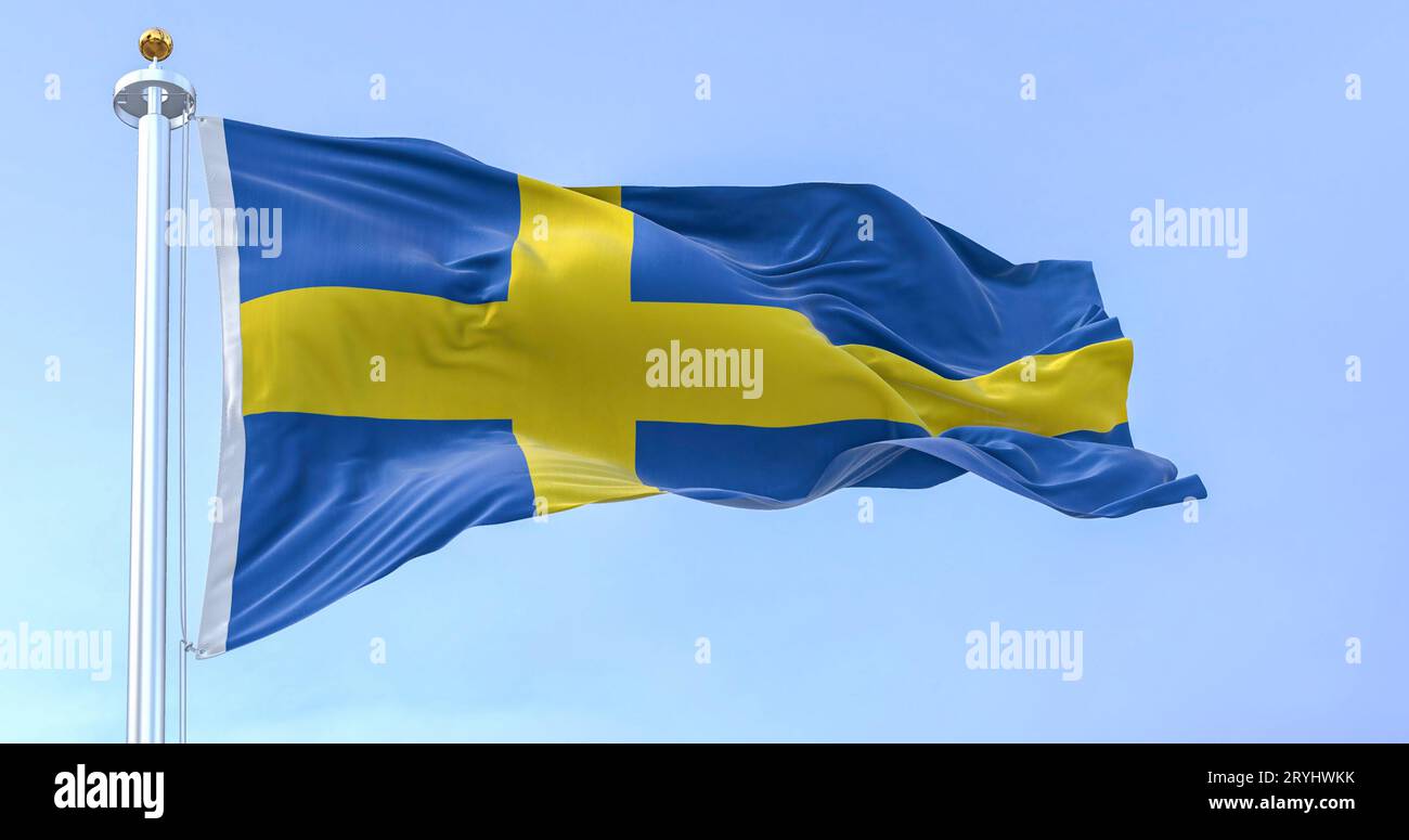 The national flag of Sweden waving on a clear day Stock Photo - Alamy
