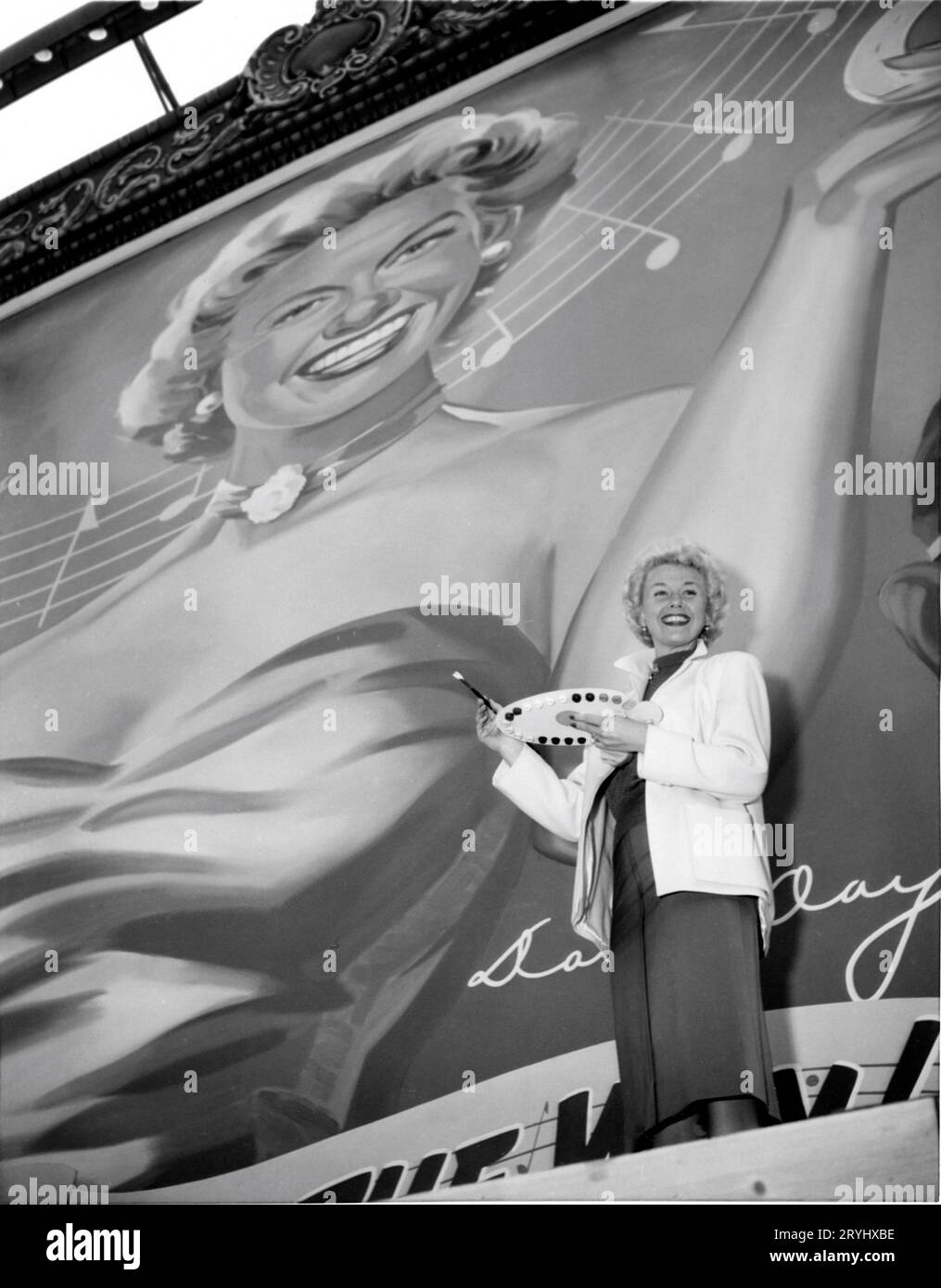 DORIS DAY signs huge billboard poster advertising her latest film LUCKY ...