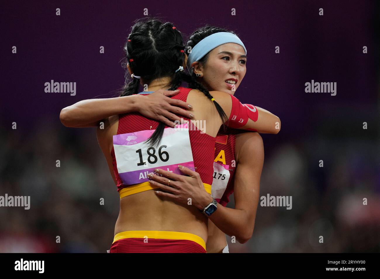 Gold medalist China's Lin Yuwei, right, is hugged by compatriot China's ...