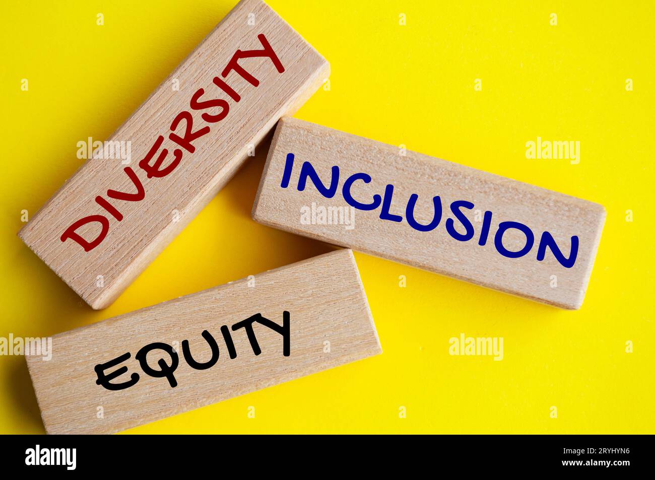 Top view of close up wooden blocks with text - Diversity, inclusion and ...