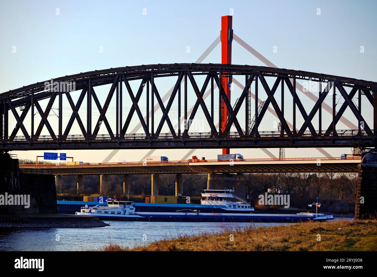 Ship traffic on the Rhine and railway bridge with the A 42 motorway ...