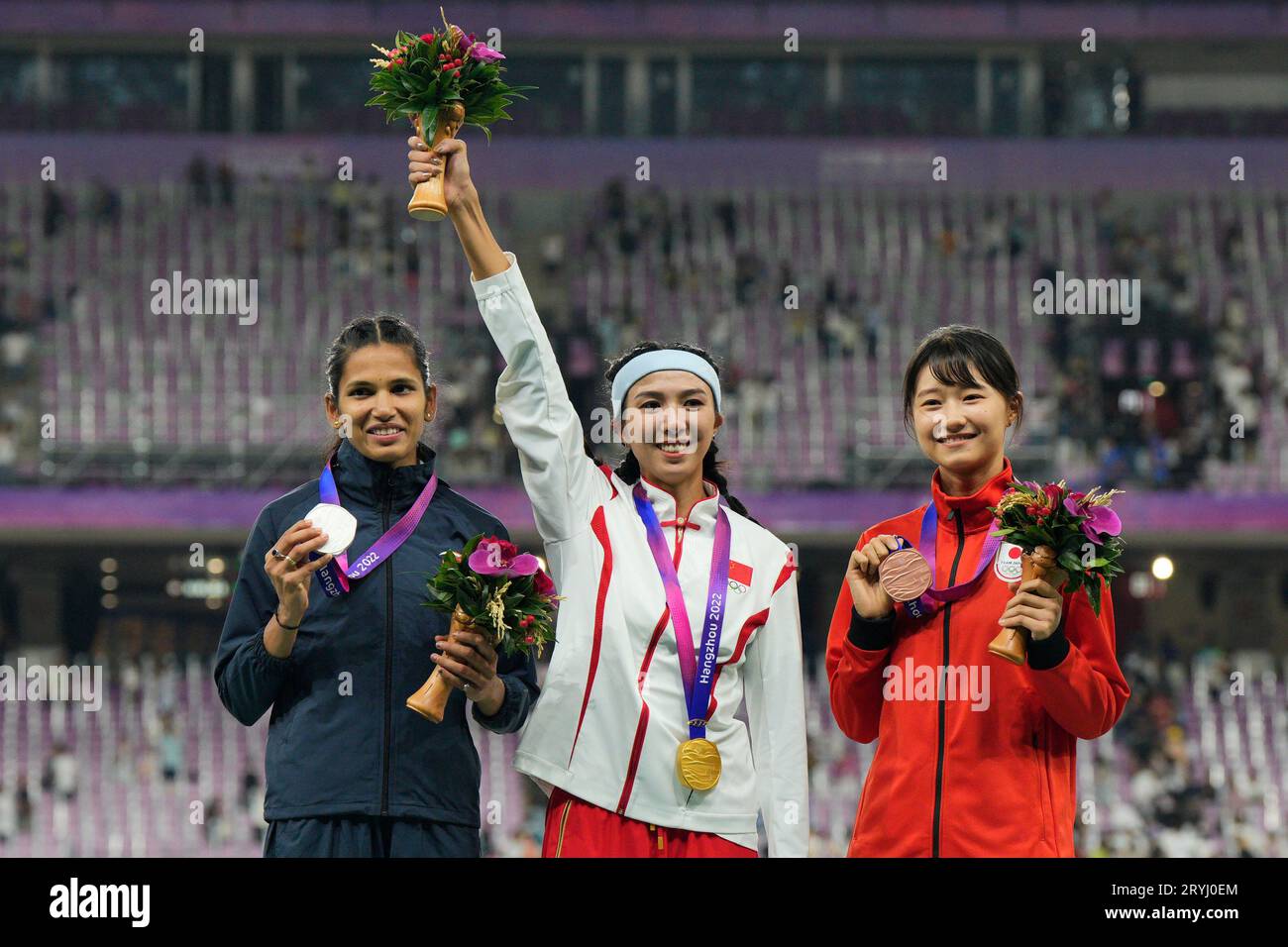 Medalists, from left to right, India's Jyothi Yarraji, silver, China's ...