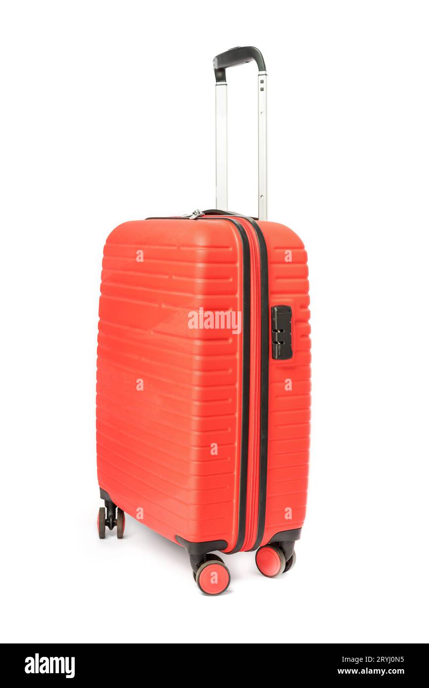 Travel red suitcase isolated on white background Stock Photo - Alamy