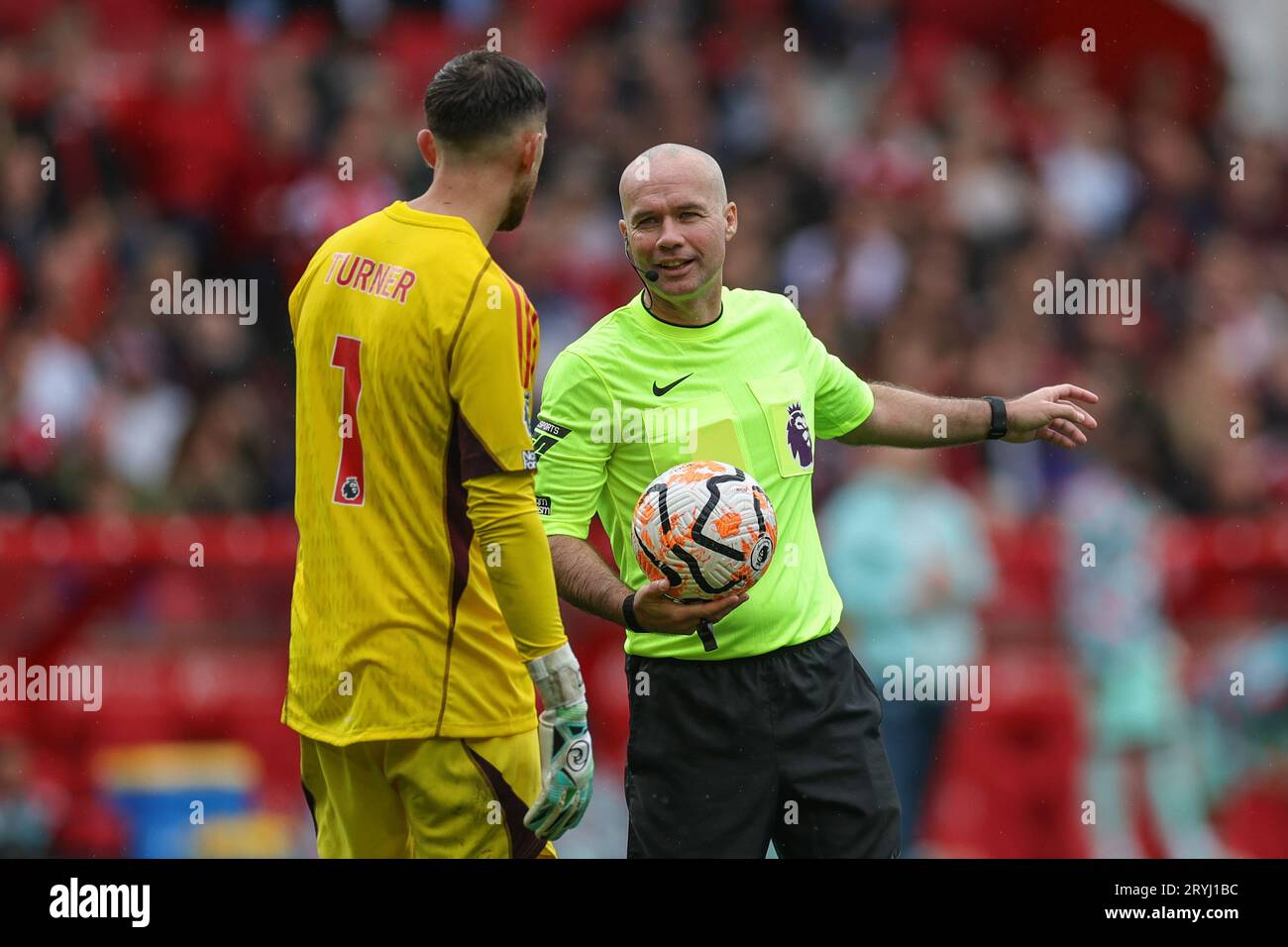 Referee Paul Tierney talks to Matt Turner #1 of Nottingham Forest ...