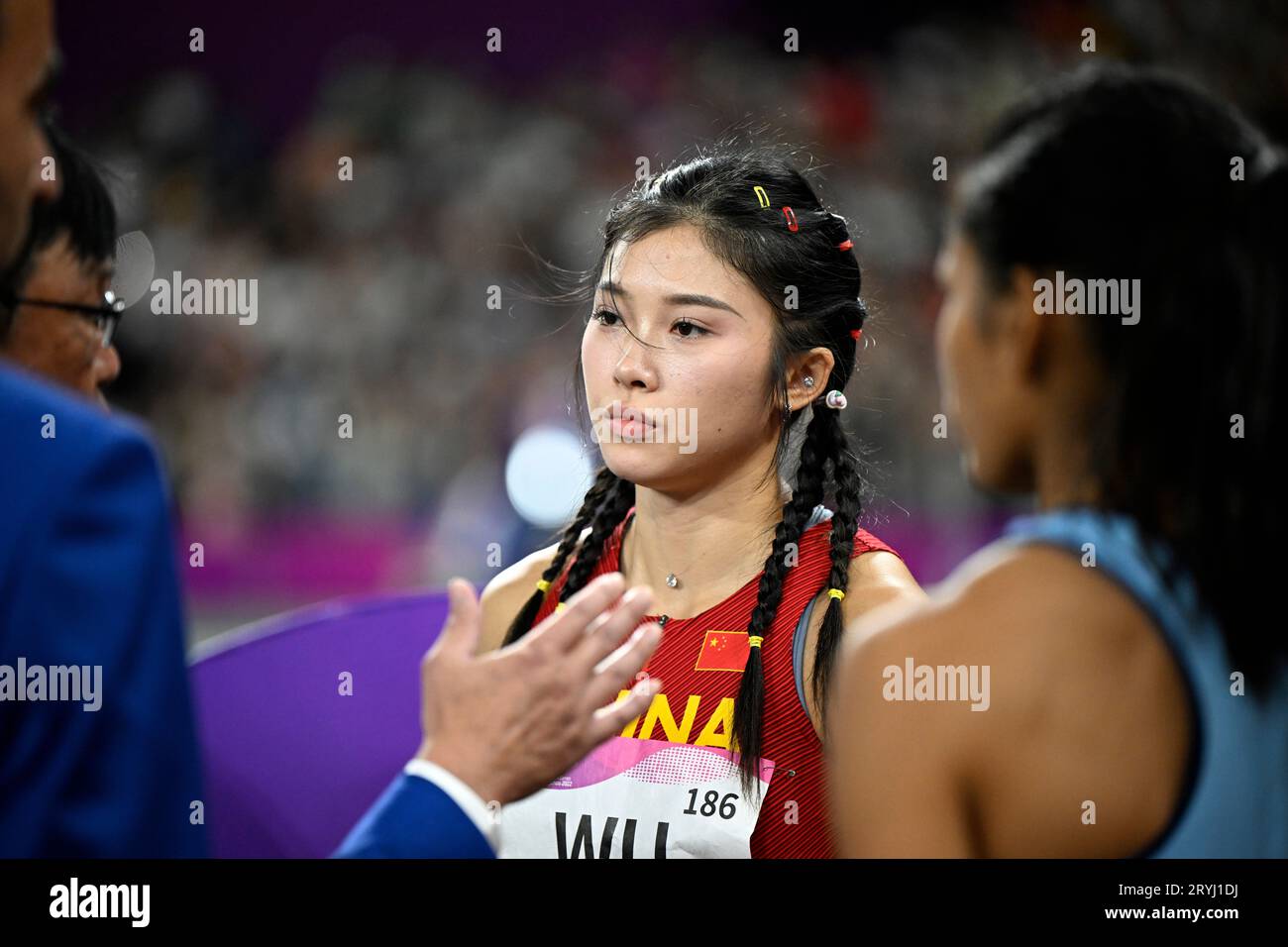 Hangzhou, China's Zhejiang Province. 1st Oct, 2023. Wu Yanni (C) of ...