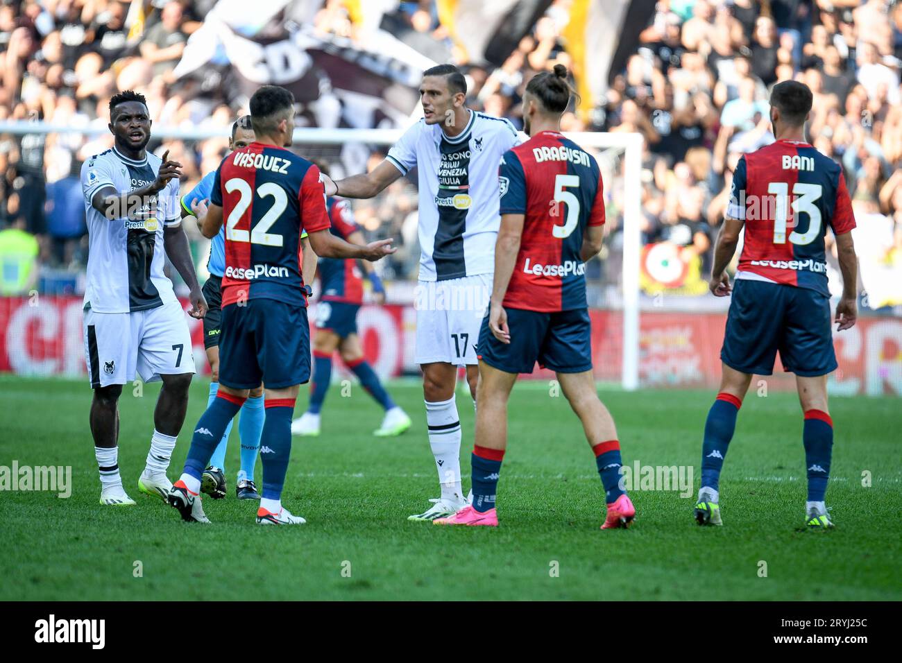 Udine, Italy. 01st Oct, 2023. Udinese's Lorenzo Lucca talks to Cagliari ...