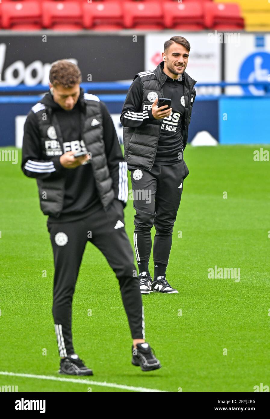 Harry Winks #8 of Leicester City inspects the pitch ahead of the match ...