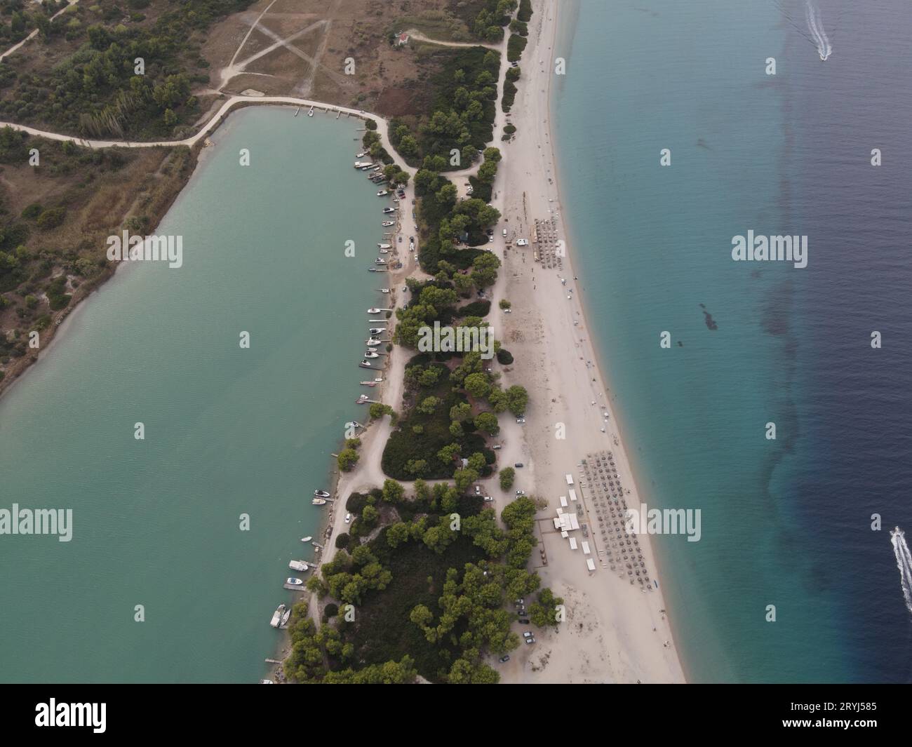 Overhead drone photo over the tropical blue ocean and the bay of ...