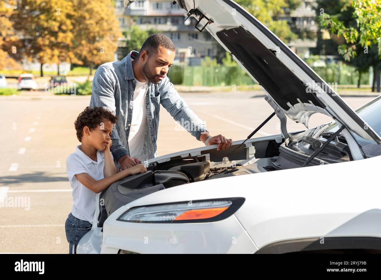 Father teaching son car repair hi-res stock photography and images - Alamy