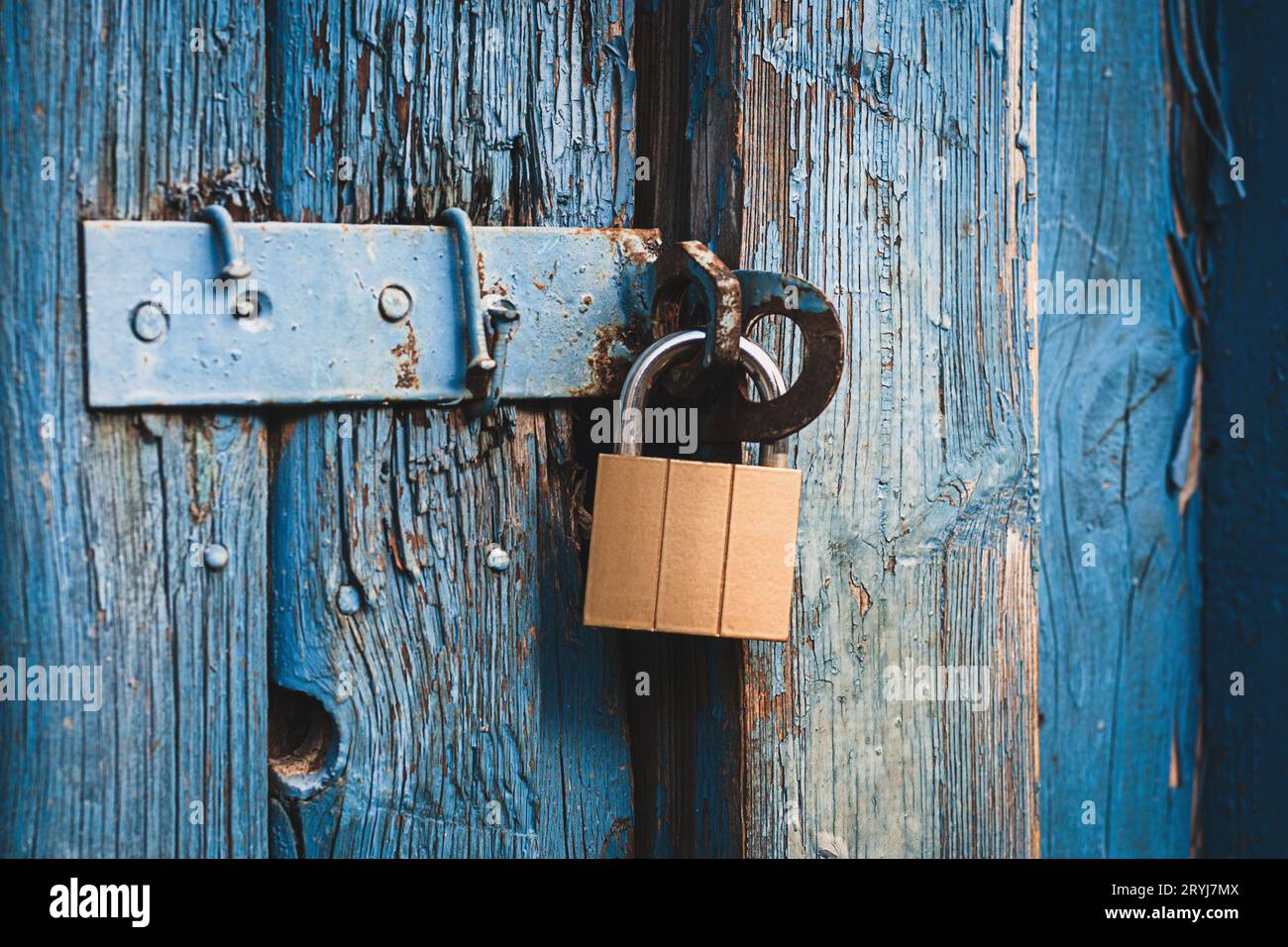 Old locked wooden blue hi-res stock photography and images - Alamy