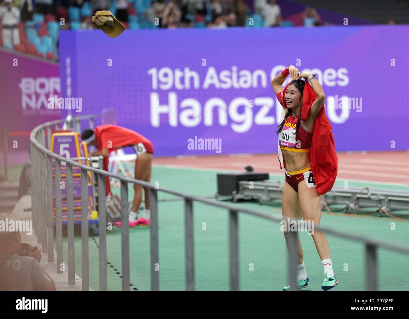 Hangzhou, China's Zhejiang Province. 1st Oct, 2023. Wu Yanni (R) of ...