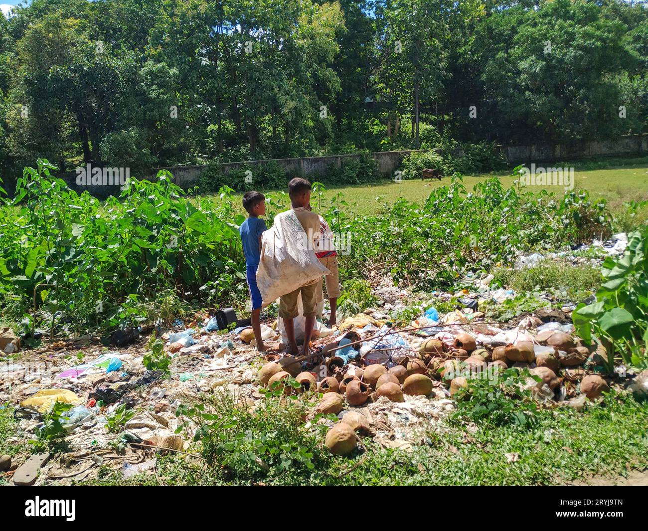 This is a child who is picking the trash and selling to feed his family ...
