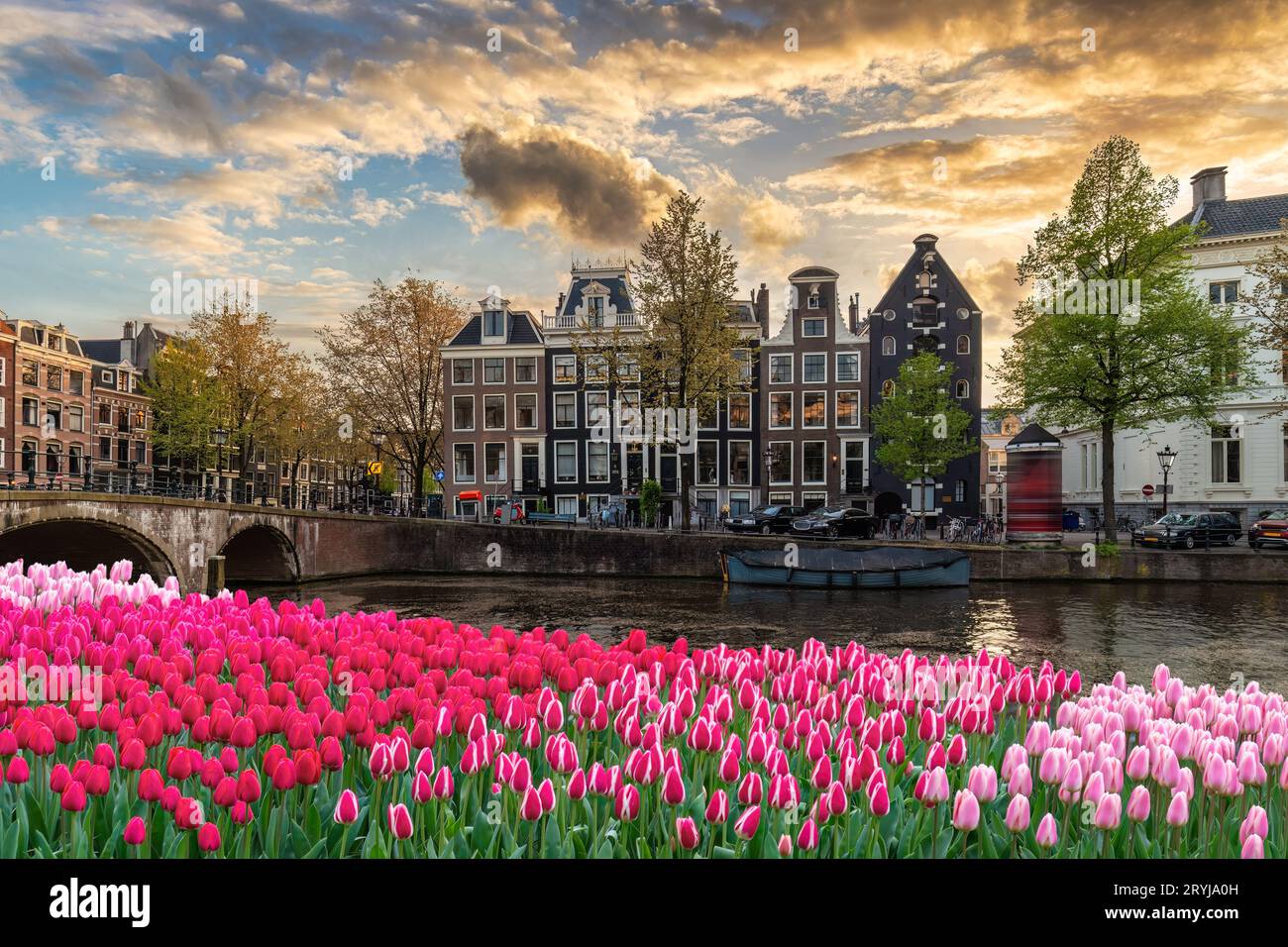 Amsterdam Netherlands, city skyline at canal waterfront with spring ...