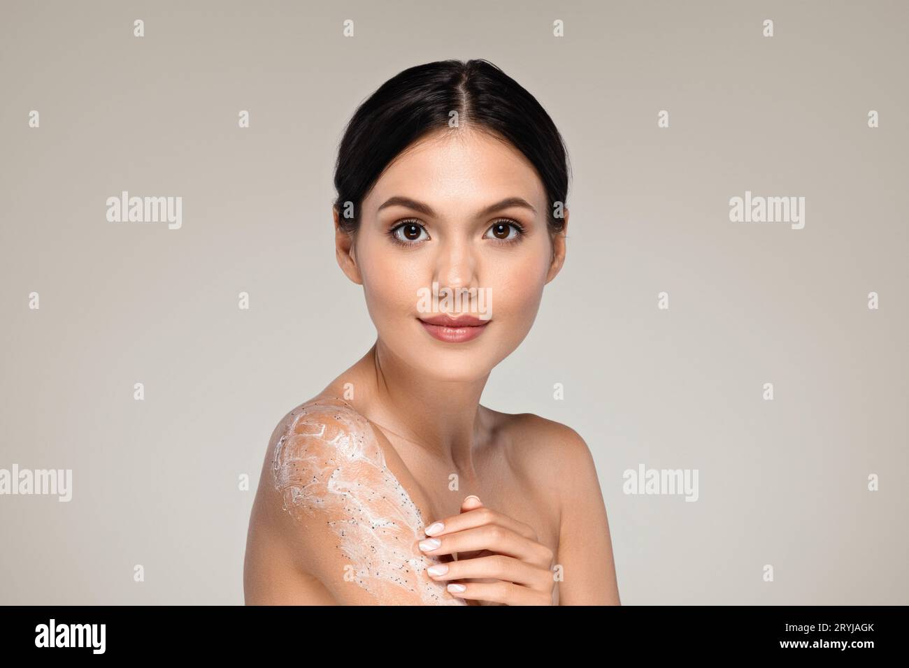 Young woman applies body scrub hi-res stock photography and images - Alamy