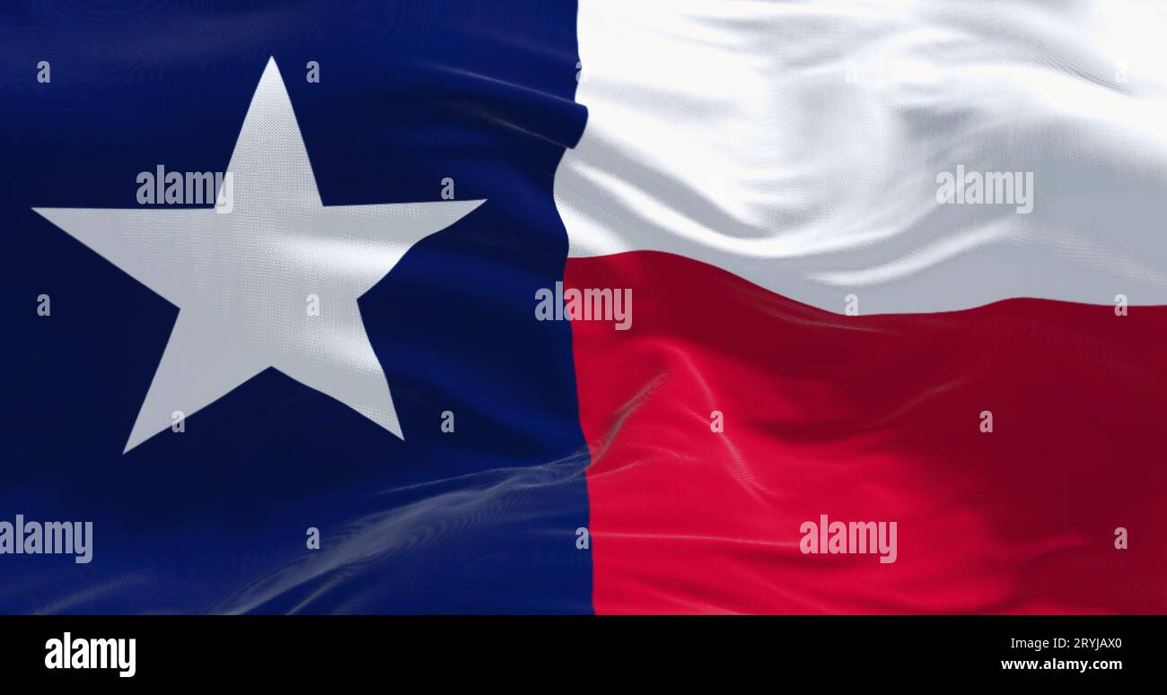 Texas flag waving in wind hi-res stock photography and images - Alamy