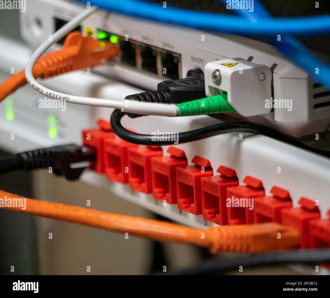Communication equipment connected with copper and optical cables Stock ...