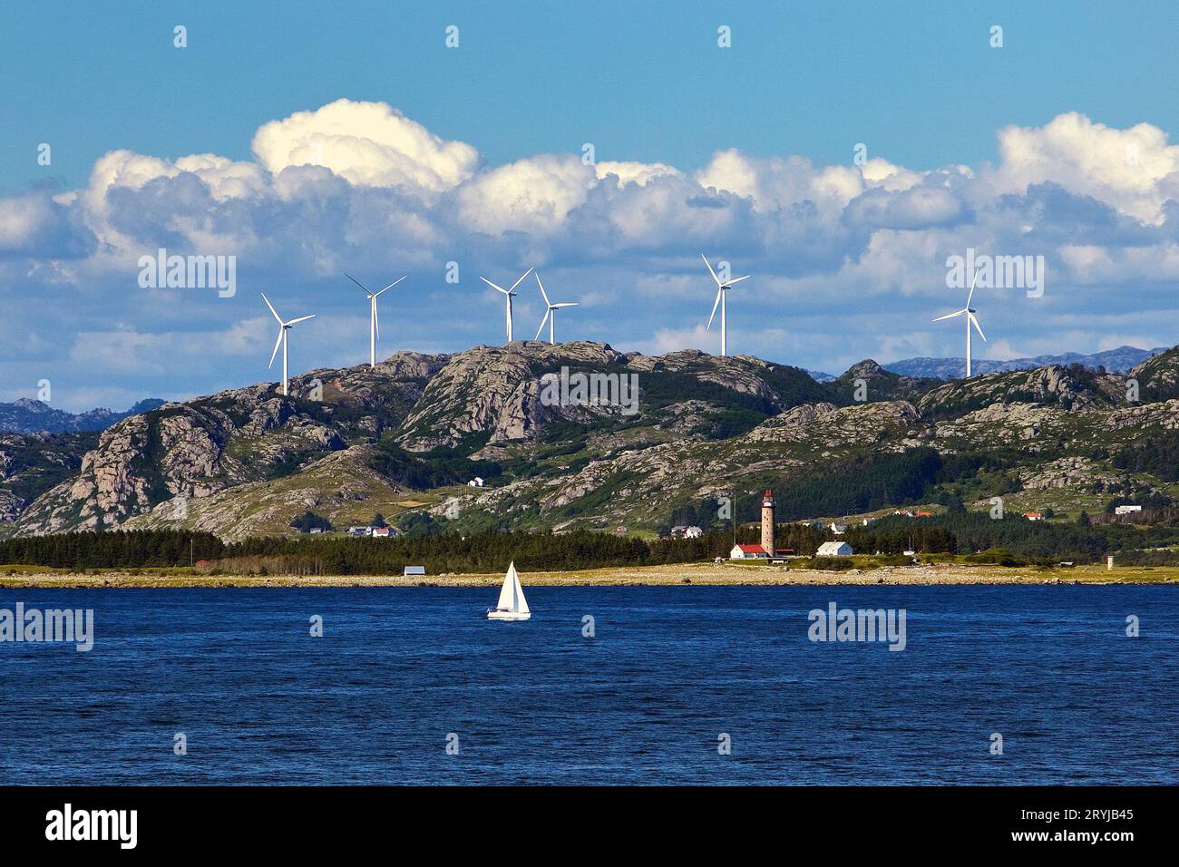 North Sea with coast landscape, sailing boat and lighthouse Lista fyr ...