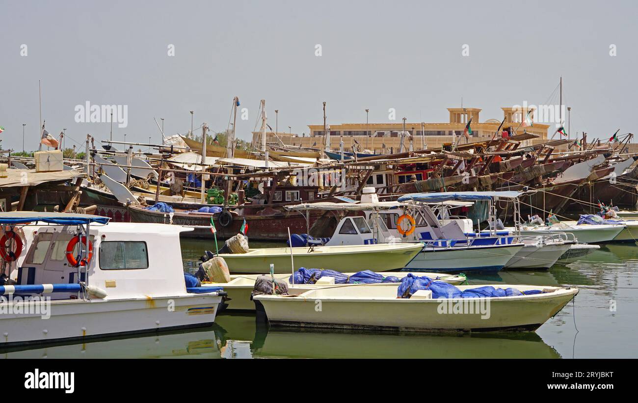 Fishermans ship and motor boats in marina Kuwait summer day Stock Photo ...