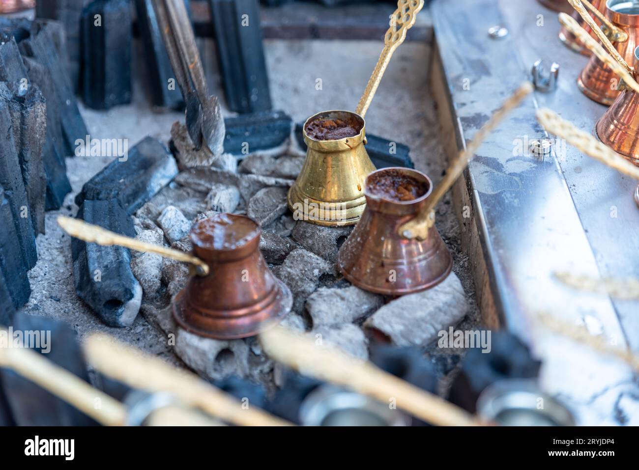 Making Turkish coffee with traditional methods , Coffee slowly cooking ...