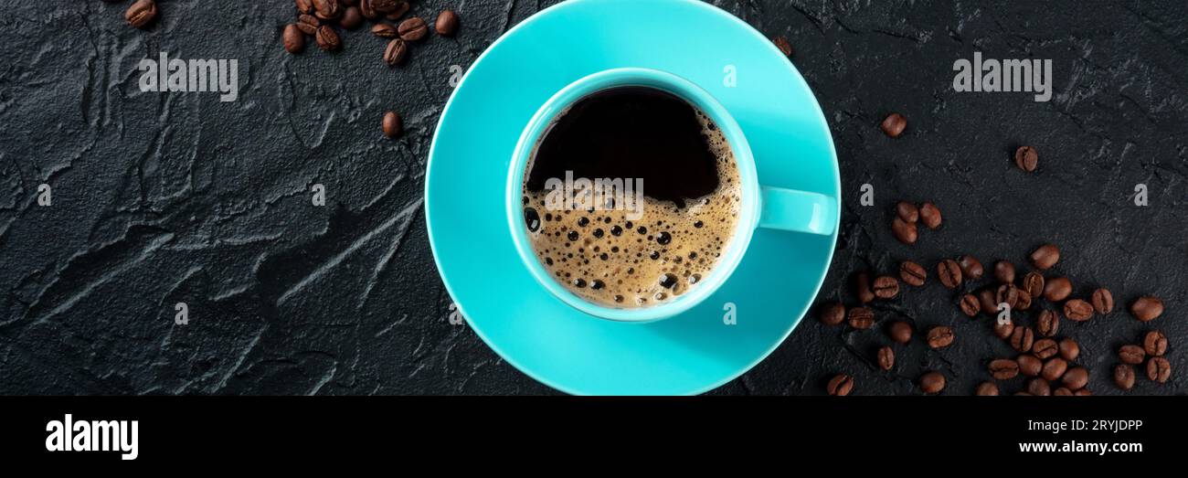 Blue coffee cup and coffee beans panorama, overhead flat lay shot on ...