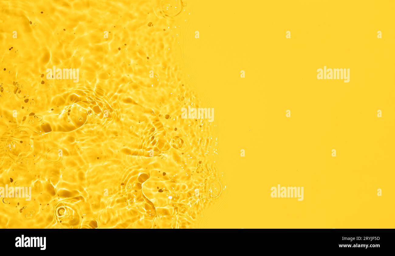 Yellow Abstract water background texture with ripples and waves Stock ...