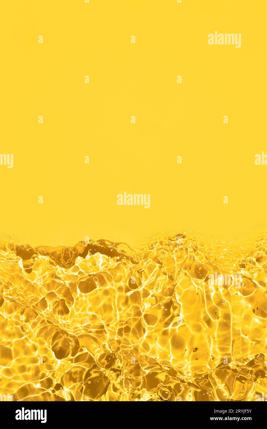 Yellow Abstract water background texture with ripples and waves Stock ...