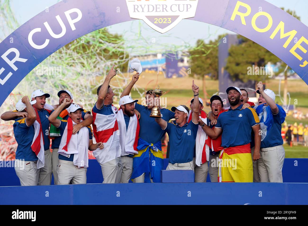 Team Europe Captain Luke Donald lifts the Ryder Cup Trophy after Europe ...