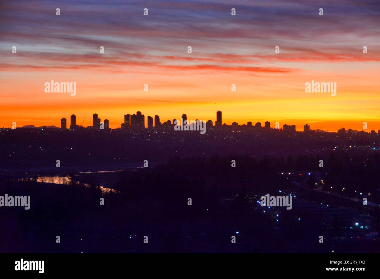 Urban and suburban residential area on sunset sky background Stock ...