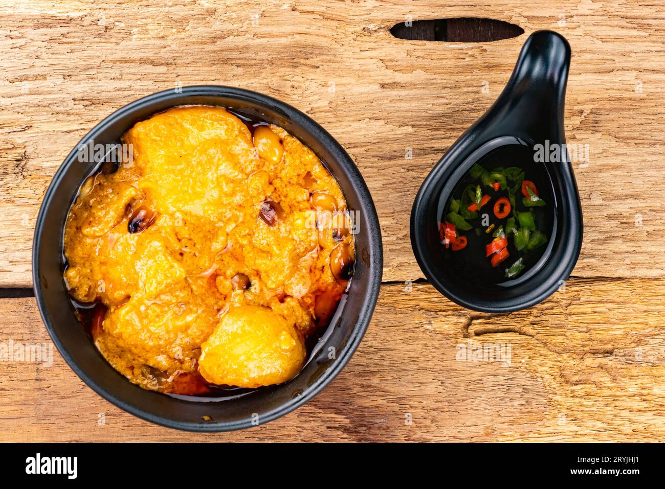Top view of delicious homemade spicy chicken curry Stock Photo - Alamy