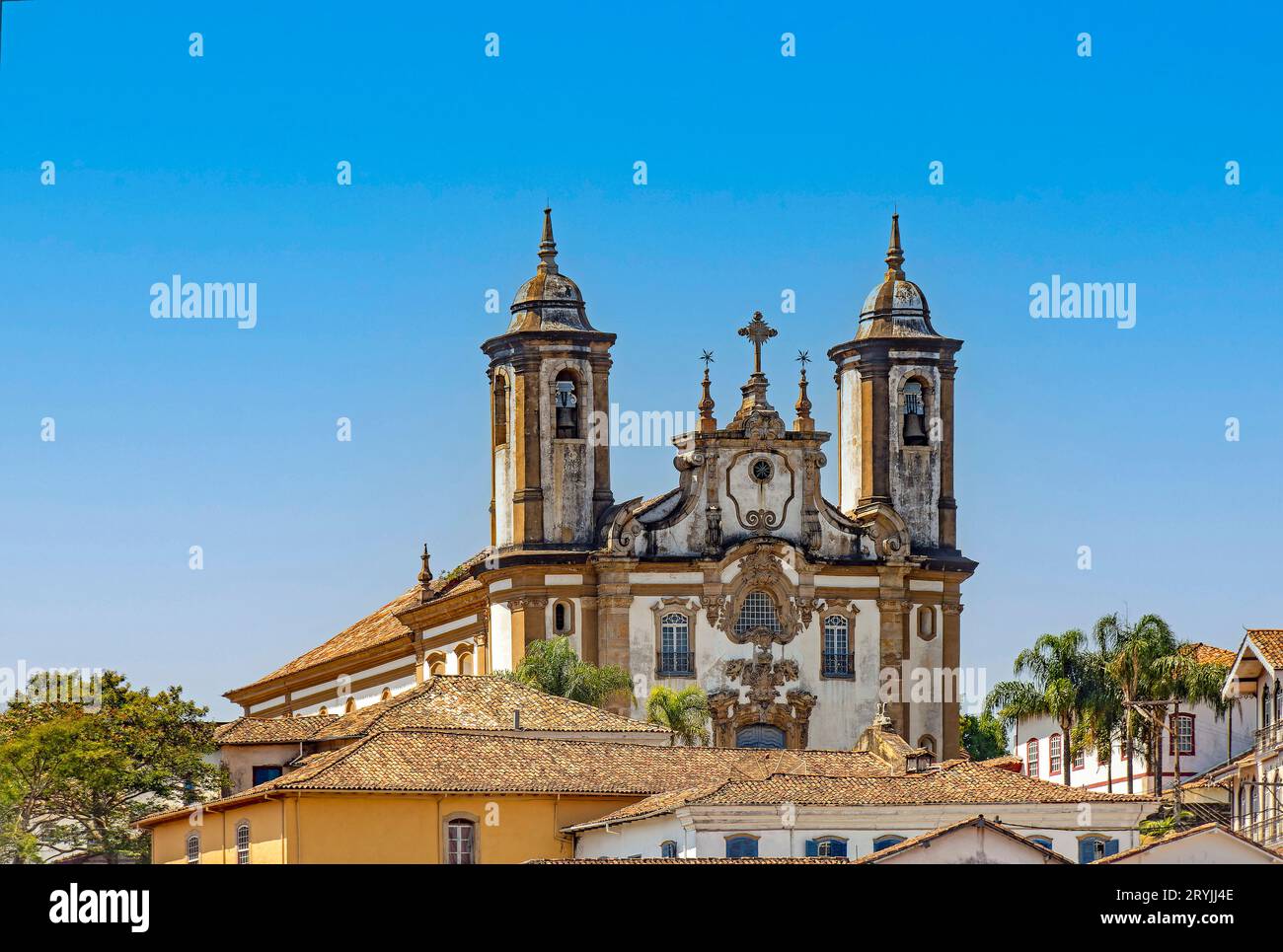 Historic church and its towers rising from among the colonial-style ...