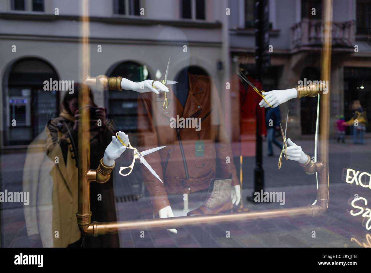 Mannequin hand holding hair scissors from the shopping windows ...