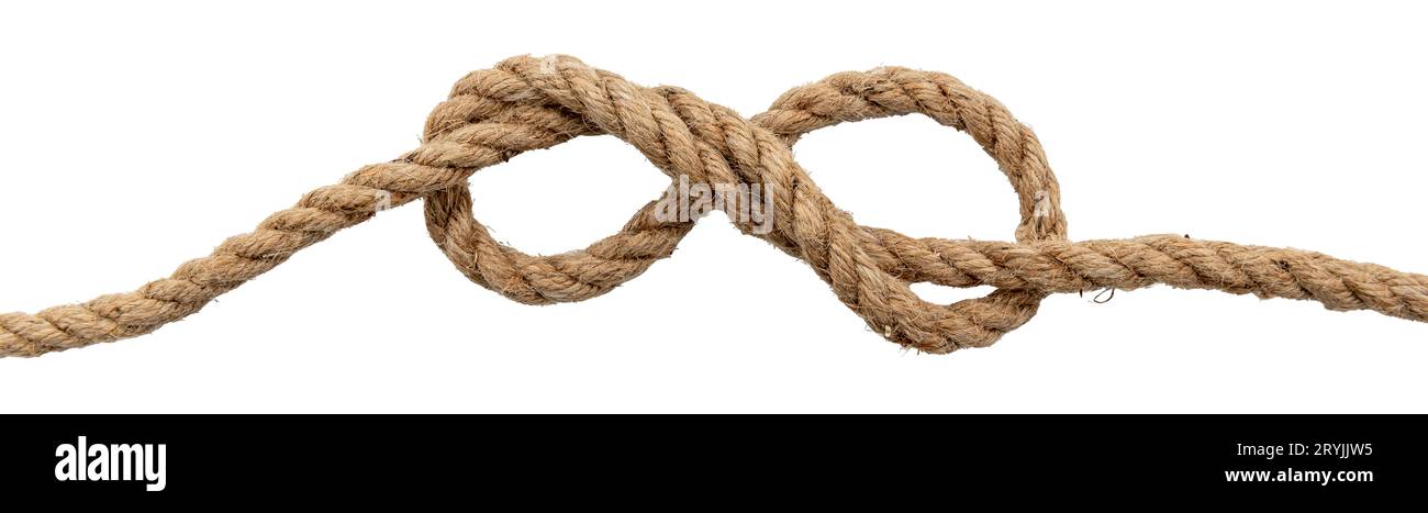 Rope made of jute in loops and knots on a white background. Linen ...