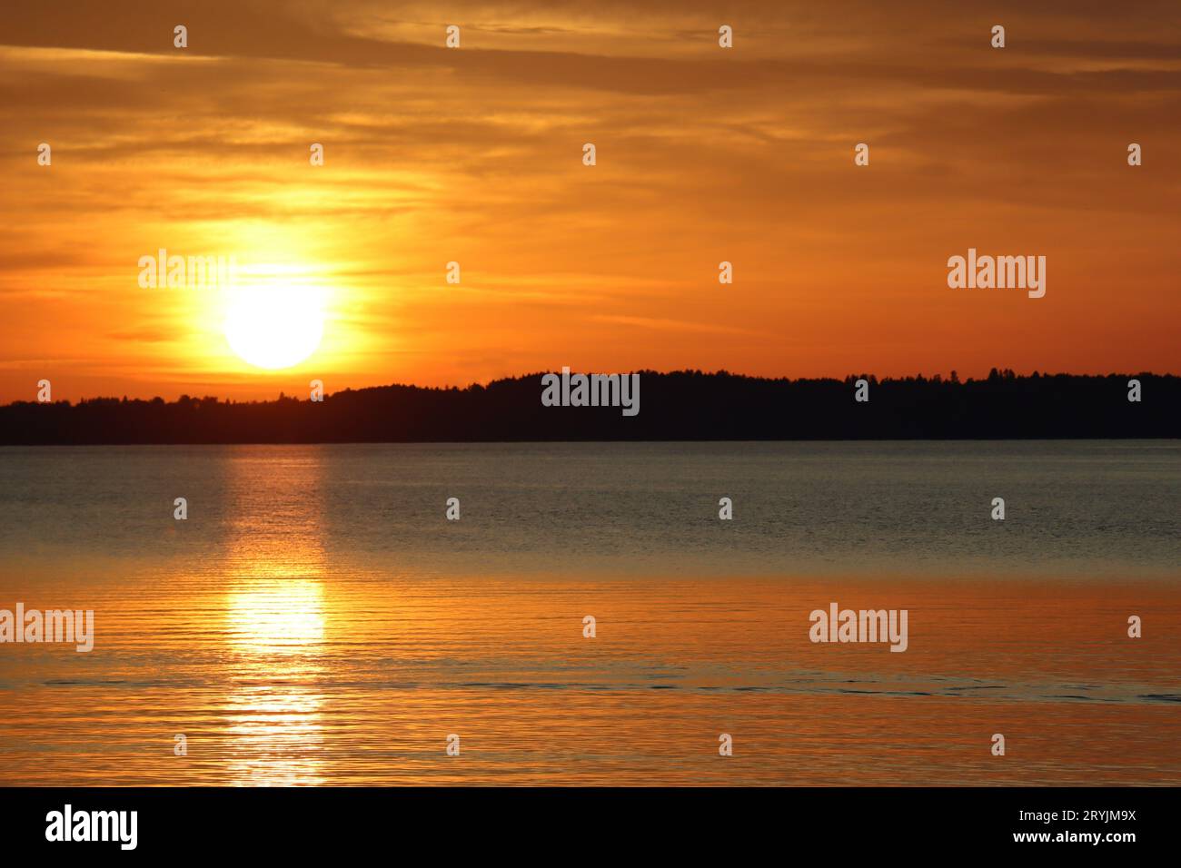 left-side Sunset with long Reflection Stock Photo - Alamy