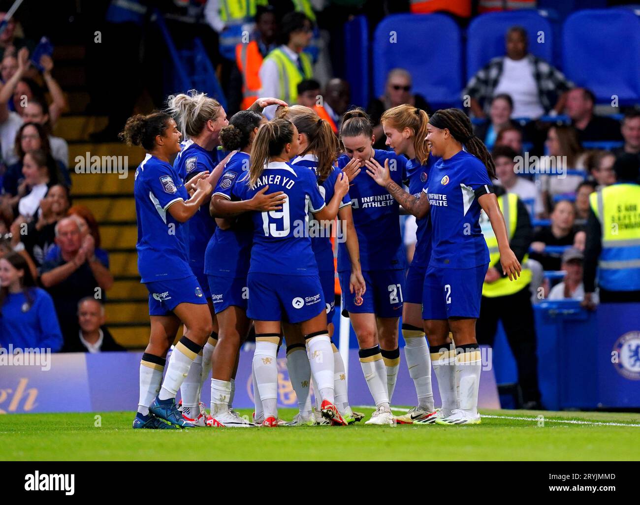Chelsea's Mia Fishel (right) celebrates with her team-mates after ...