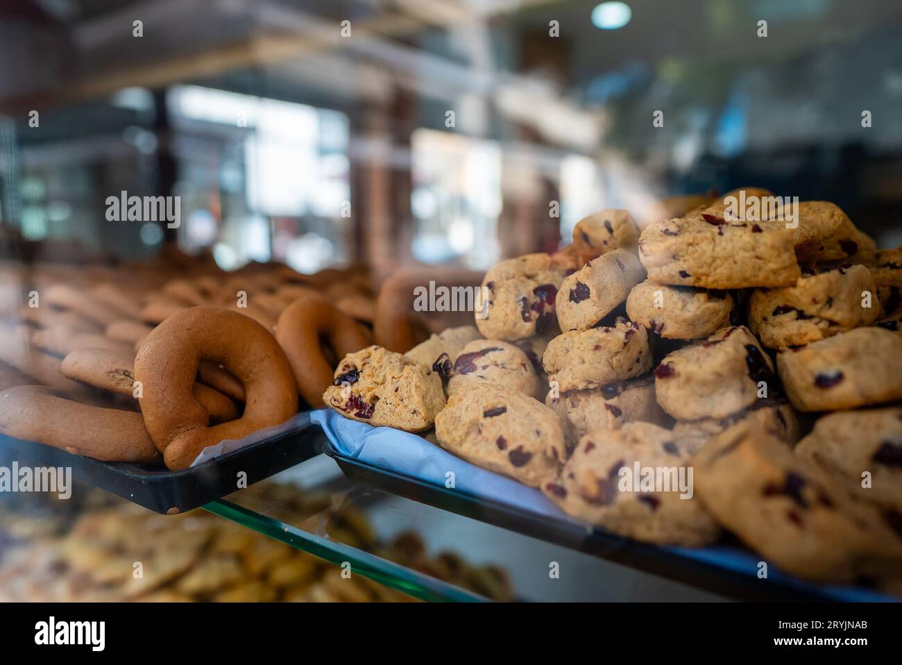 Chocolate chip cookies on display in a store window Stock Photo - Alamy